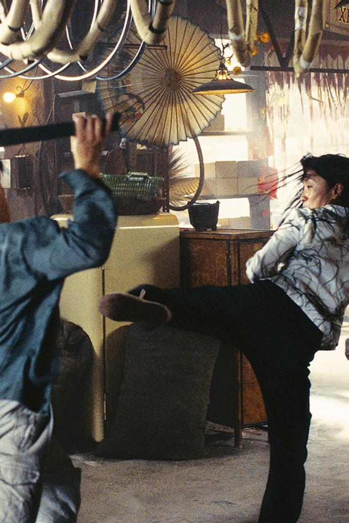 007_TND Bike Shop Fight_PORTRAIT | James Bond 007